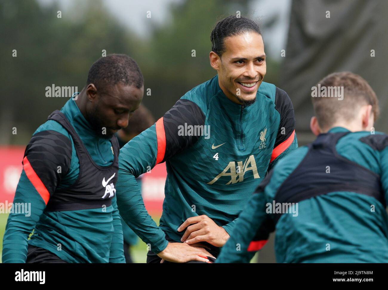 Liverpool's Virgil van Dijk (centres) smiles during a media day at the ...