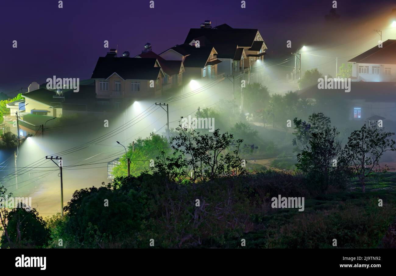 The evening landscape in the valley falling asleep with fog covered is ...