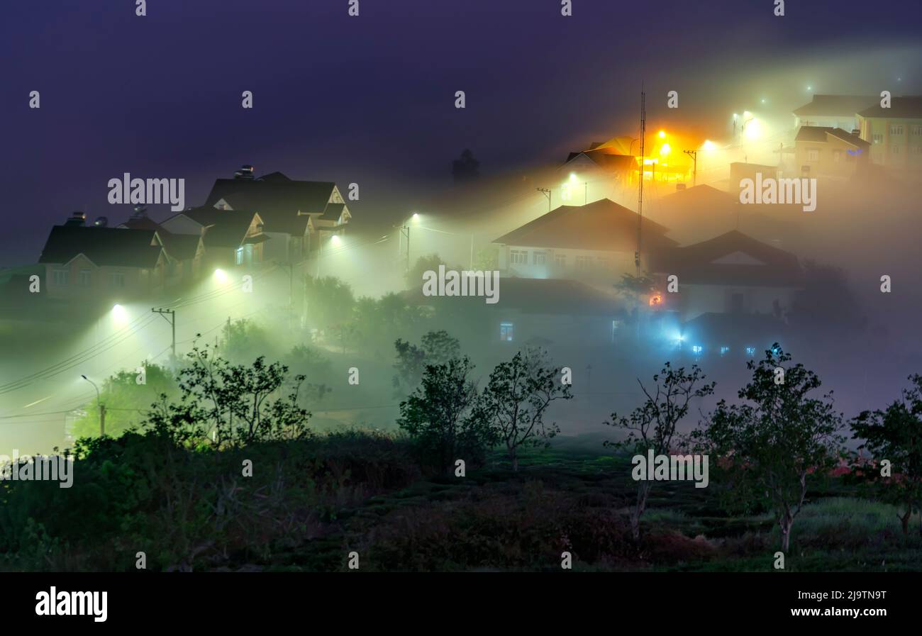 The evening landscape in the valley falling asleep with fog covered is ...