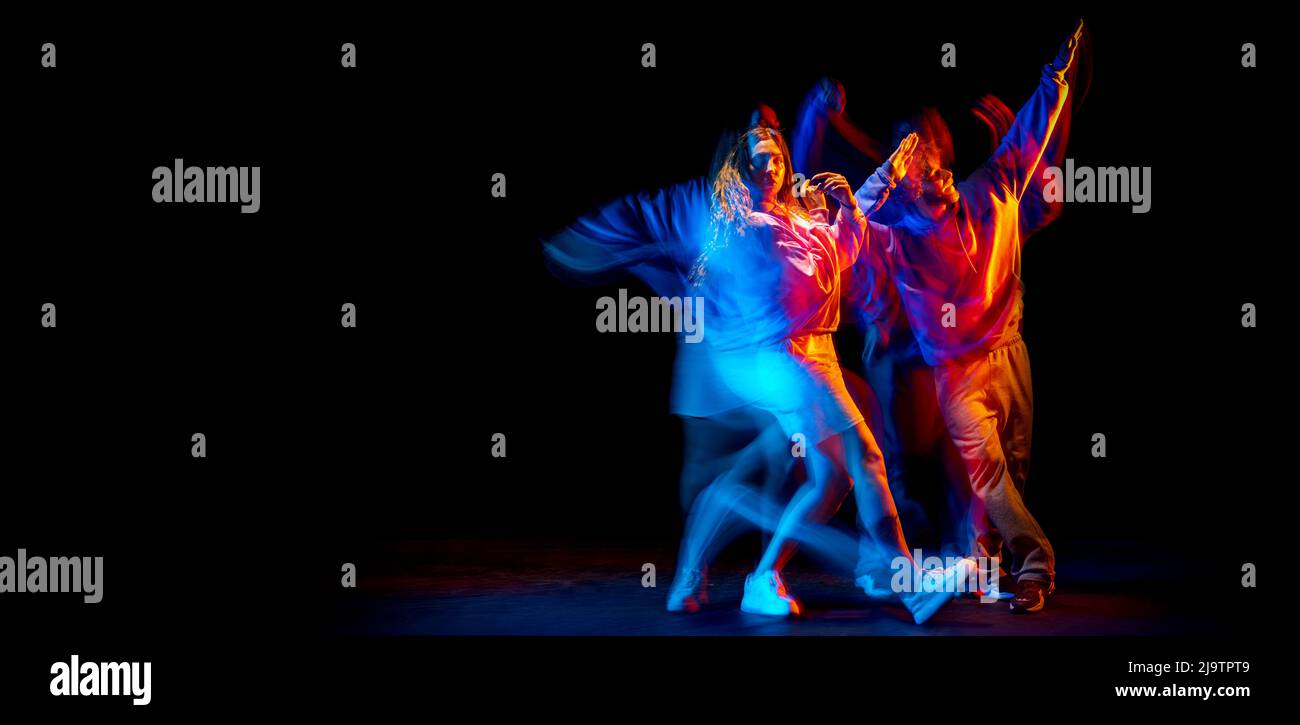 Dance show. Flexible man and girl, hip-hop dancers in motion and action ...