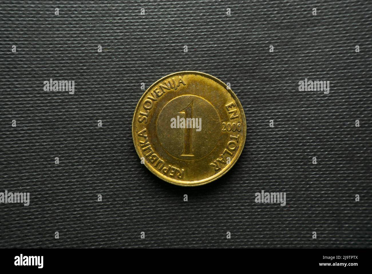 1 Slovenia Tolar, Front view, Brass Stock Photo - Alamy