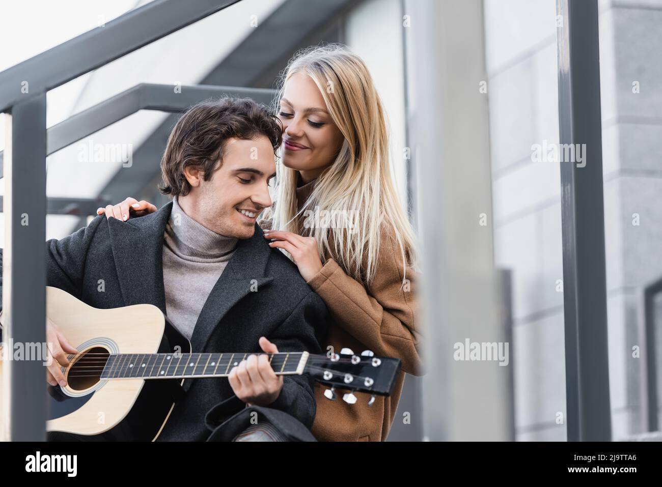 Beautiful young blonde woman hugging hi-res stock photography and ...