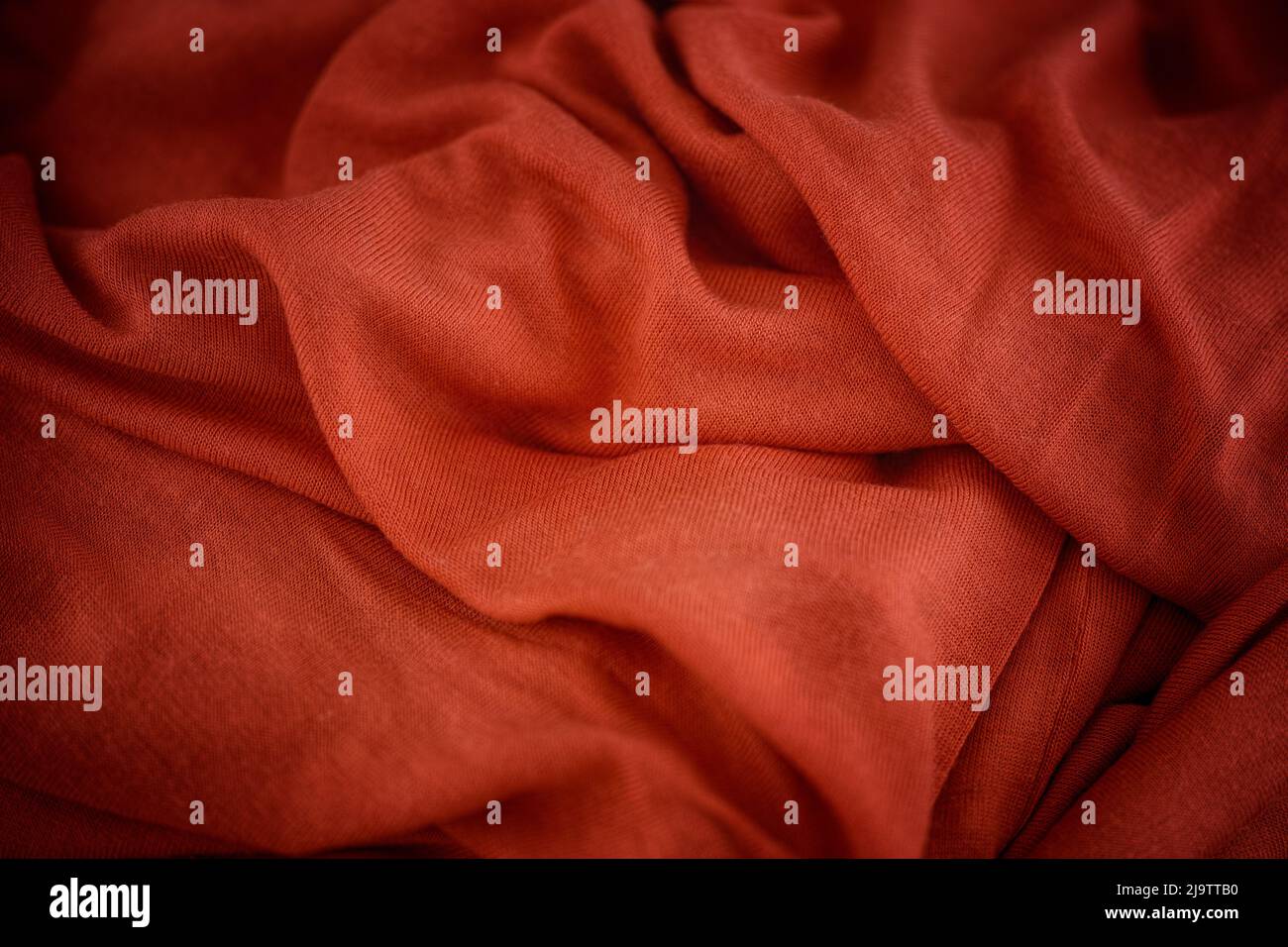 A red crumpled fabric texture background. Close up Stock Photo - Alamy