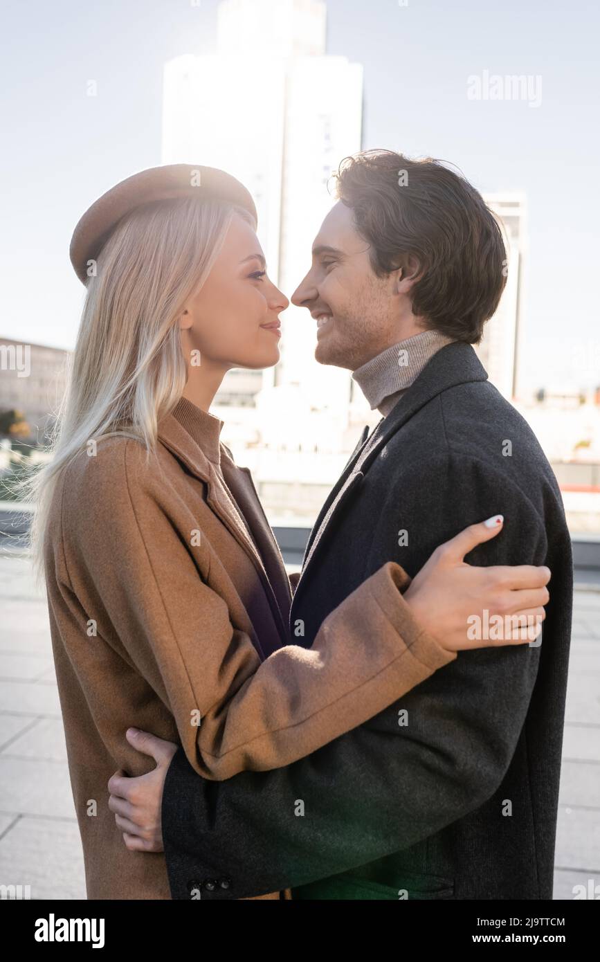 Romantic couple face to face on street hi-res stock photography and ...