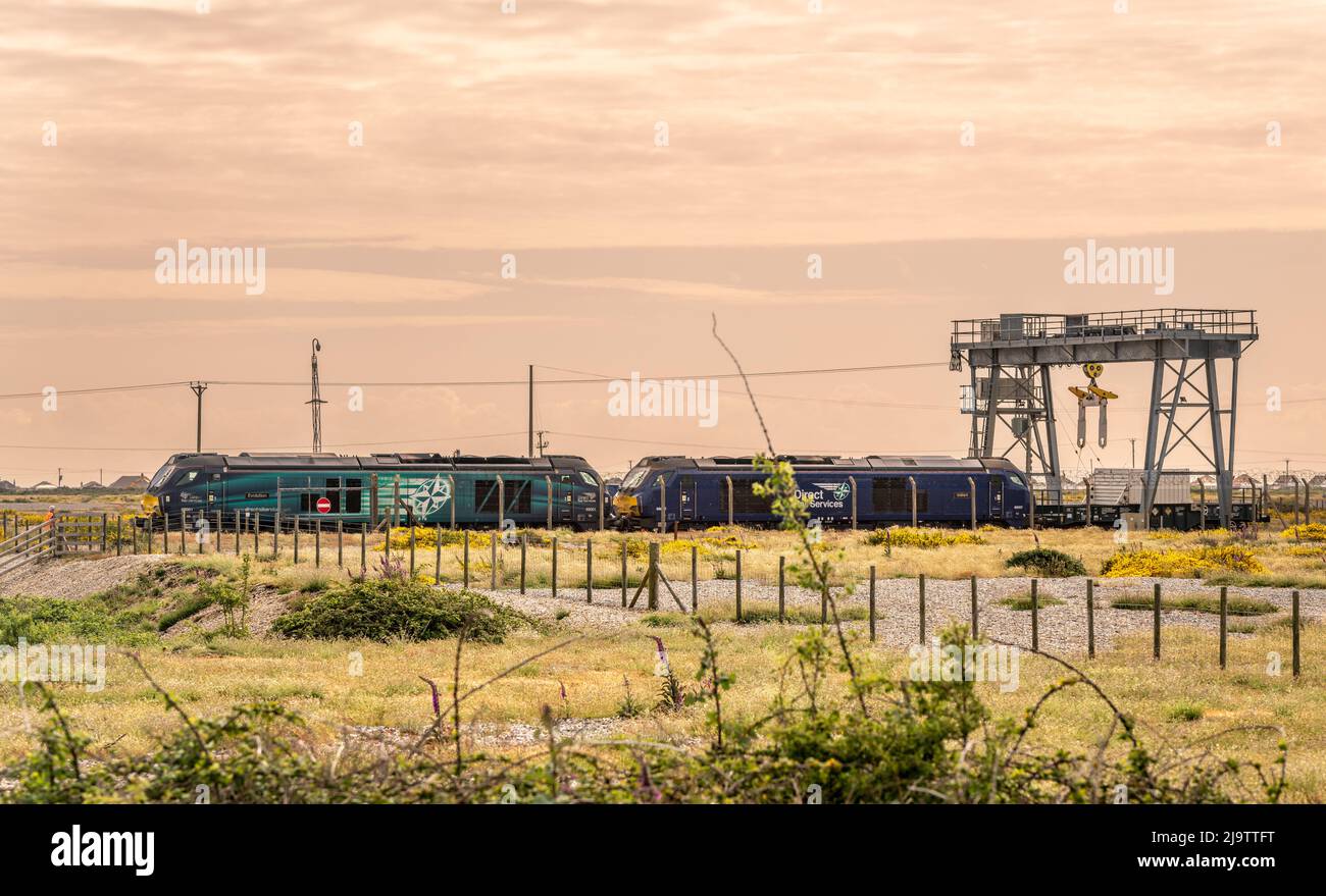 Containers are loaded onto a train at Dungeness Nuclear Terminal ...