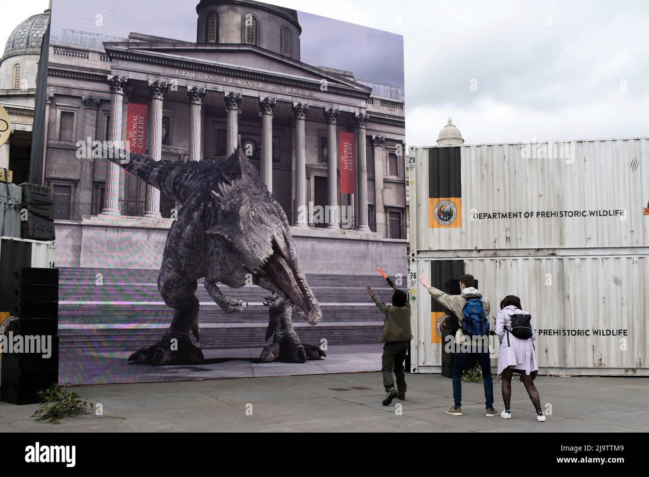 25th May, 2022. London, UK, A keeper controls the dinosaur. Jurassic ...