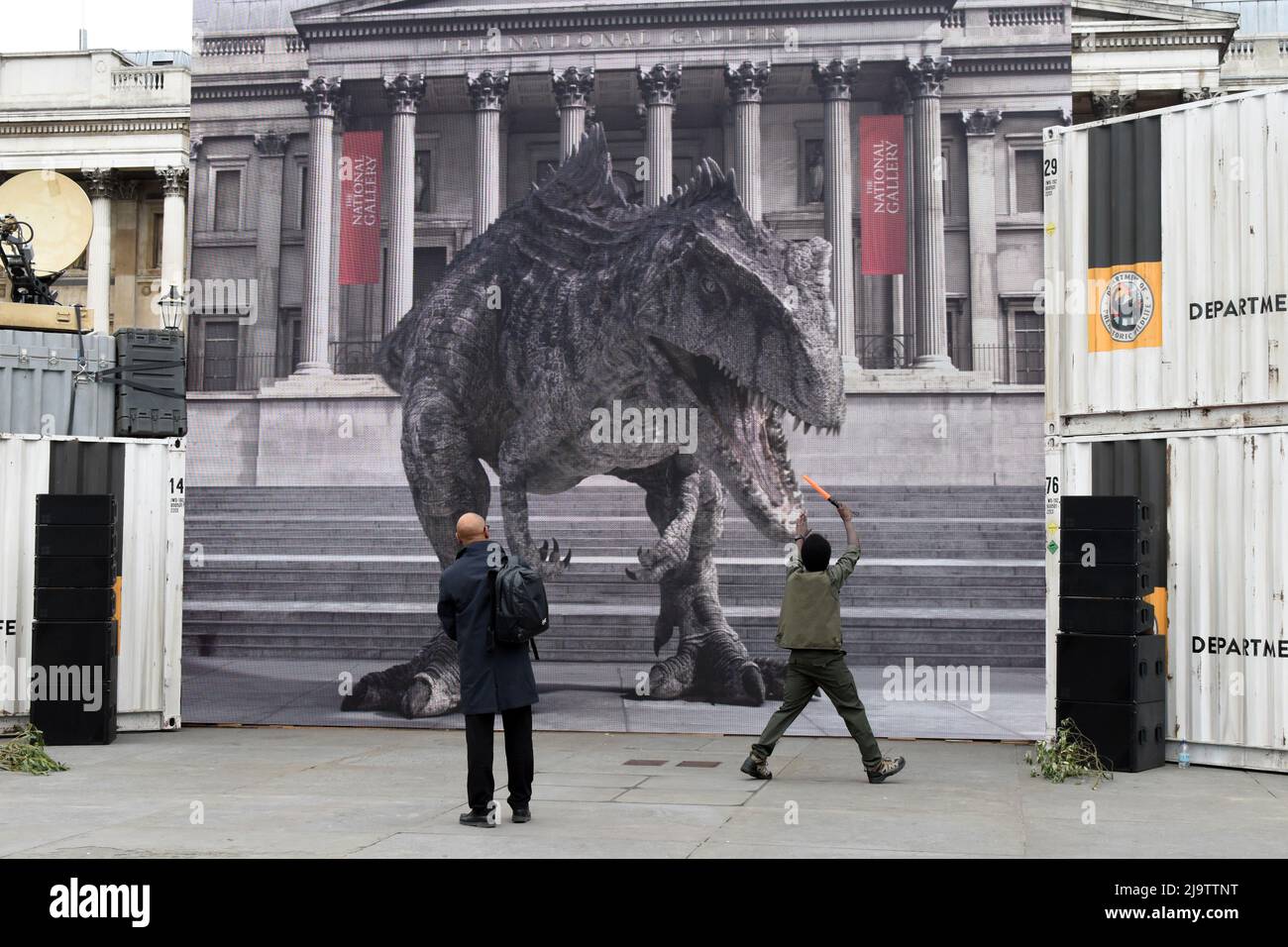 25th May, 2022. London, UK, A keeper controls the dinosaur. Jurassic ...