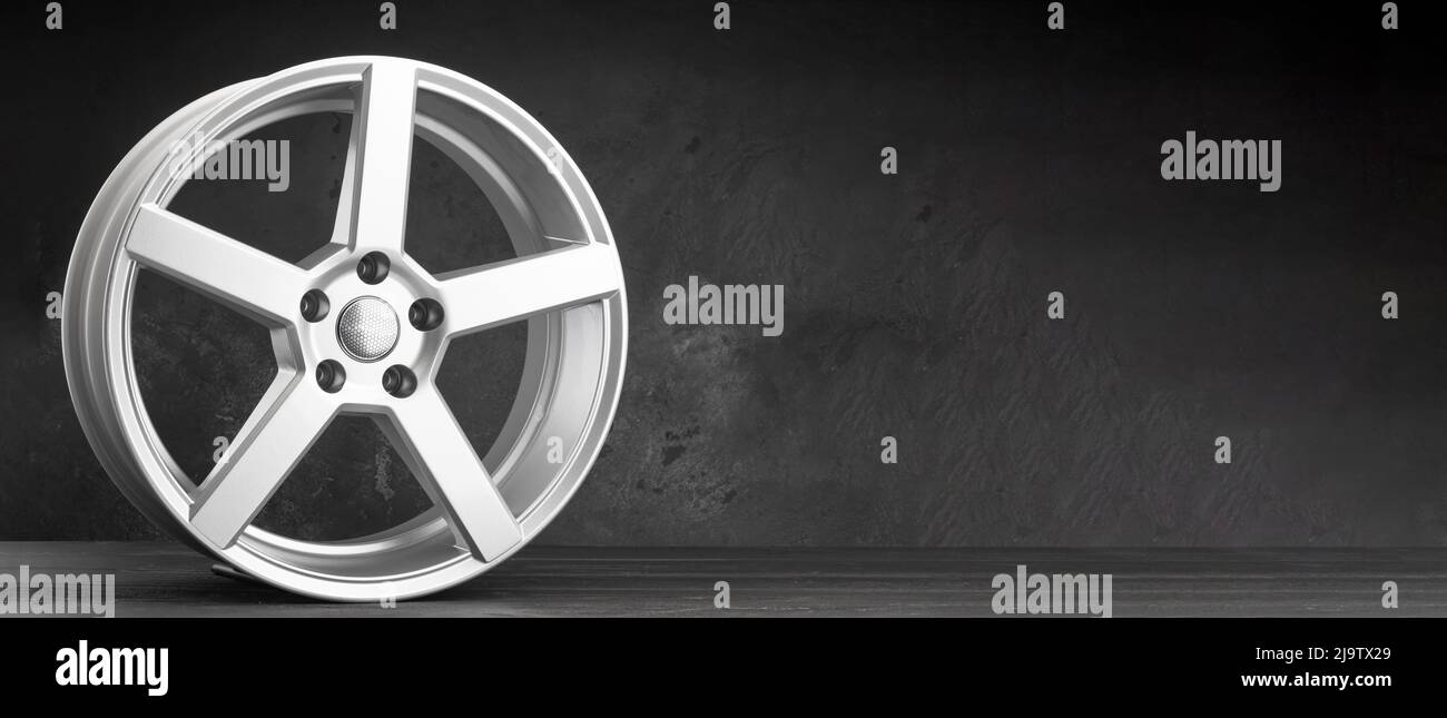 New alloy wheels silver in the form of a star on a gray background ...