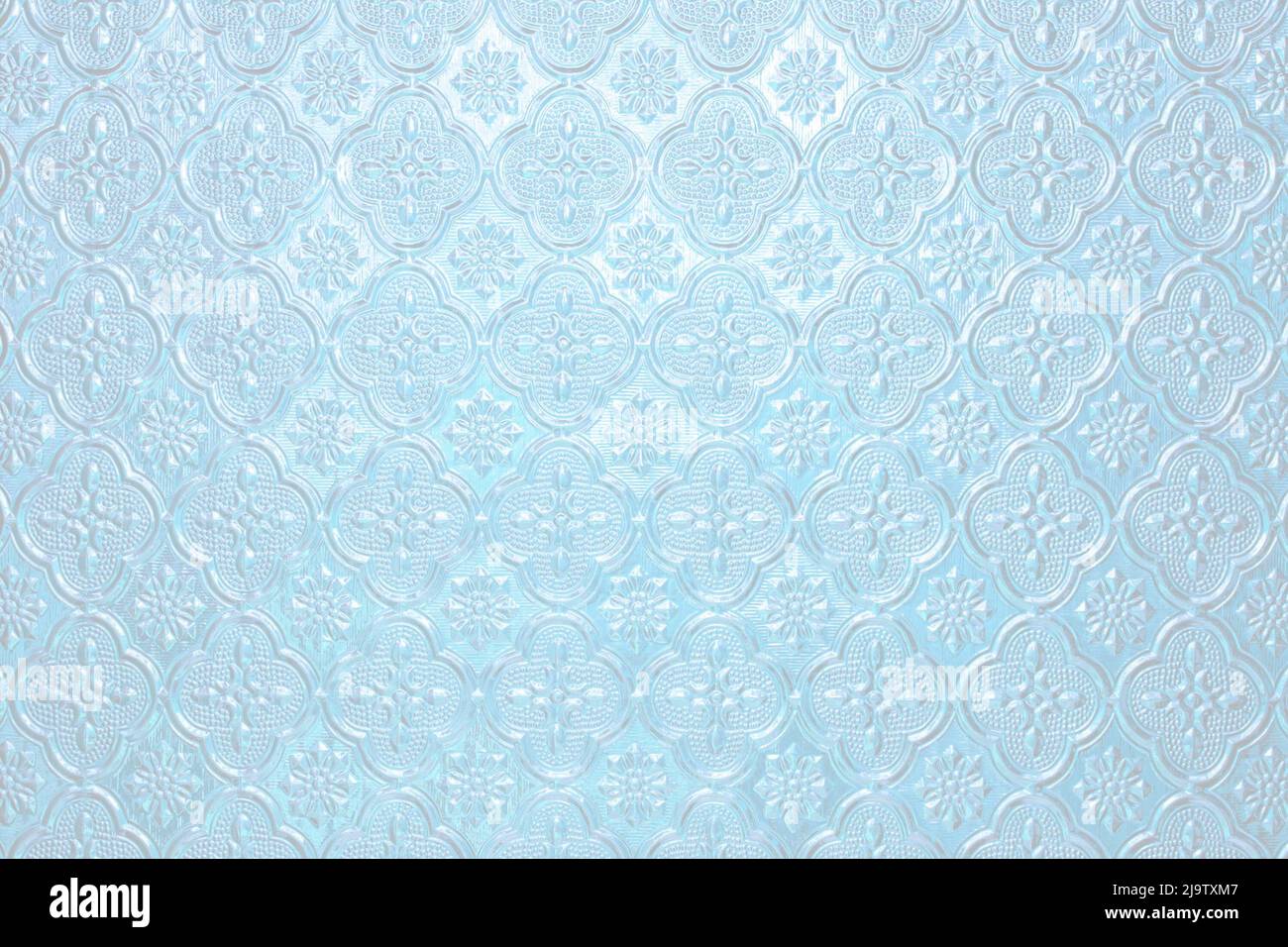 Textured pale light blue faded background with a pattern of painted ...