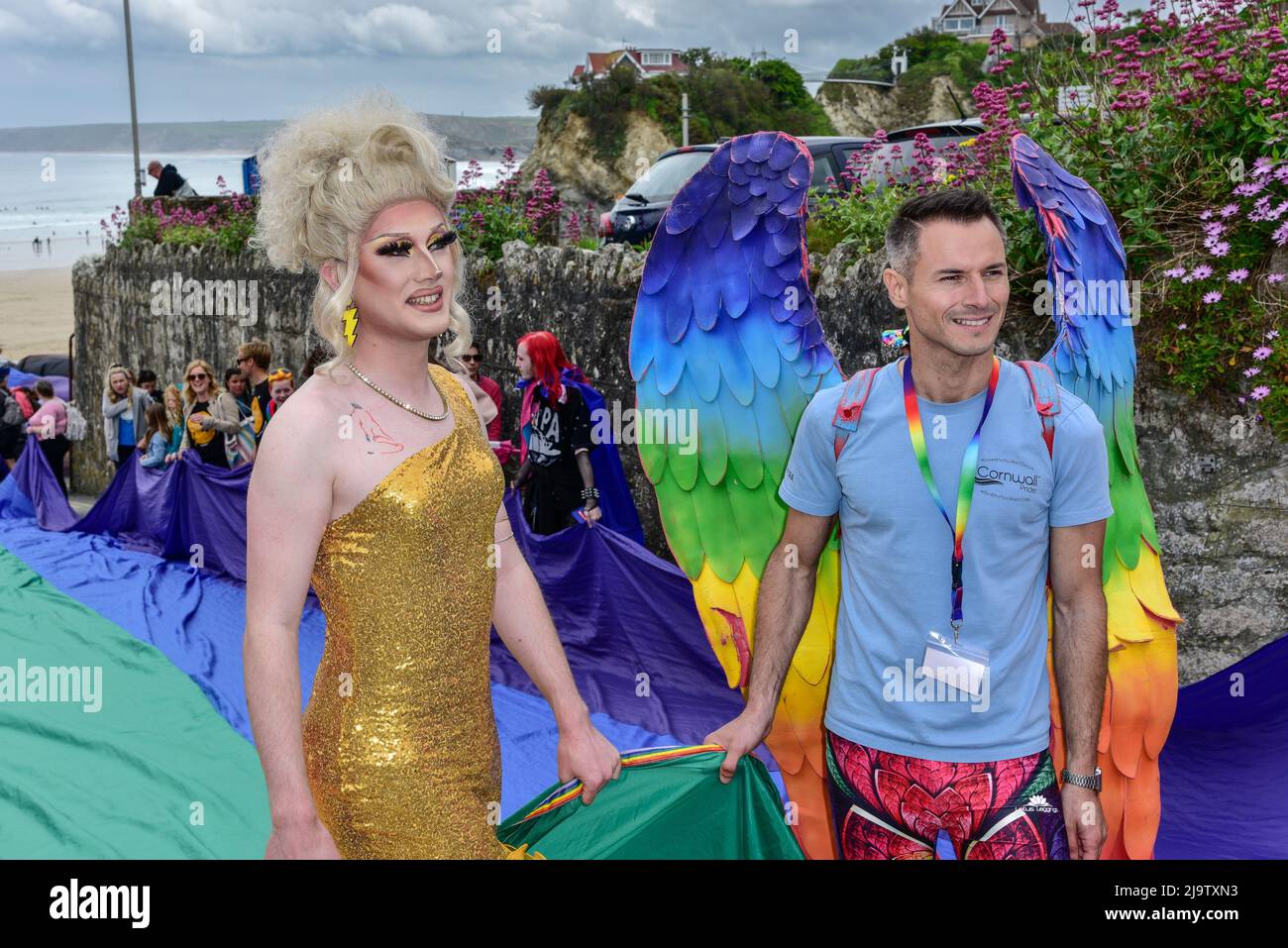 Participants holding the Gay Pride flag in the vibrant colourful ...