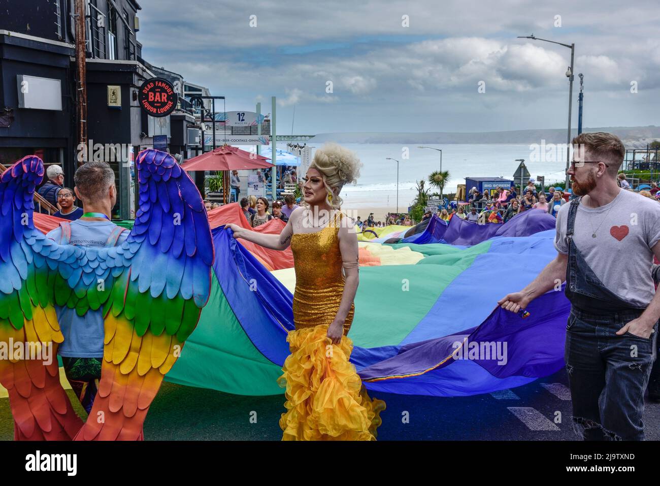 The huge vibrant colourful banner carried by participants in the ...