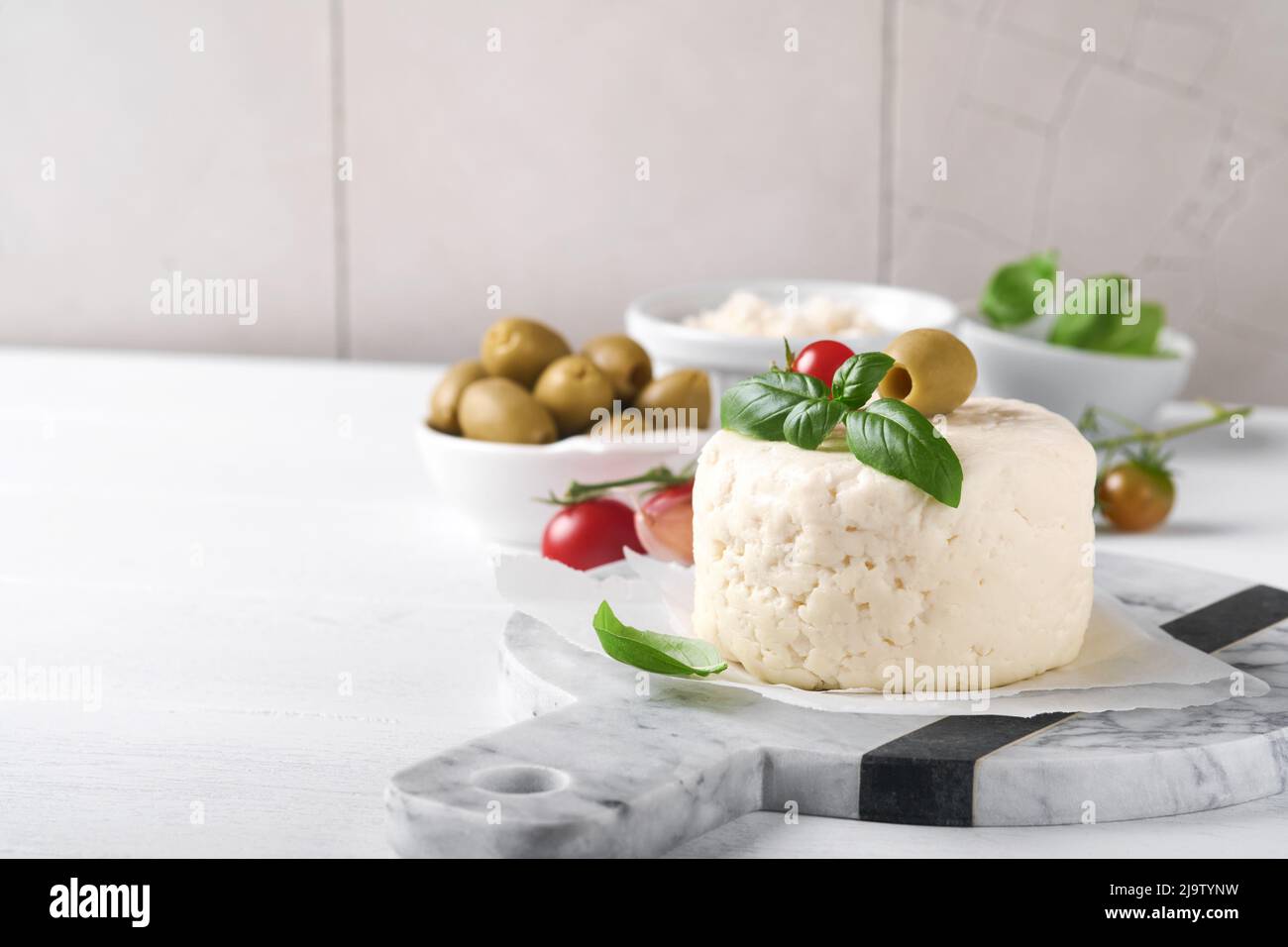 Ricotta cheese. Homemade Ricotta cheese with basil, garlic, tomatoes ...