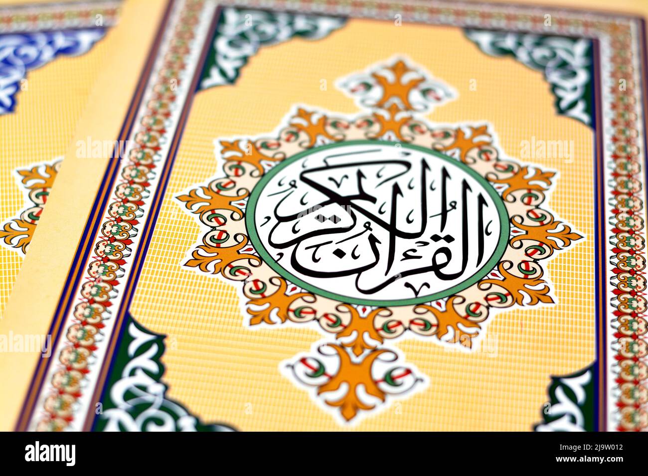 The holy Quran, Qur'an or Koran (the recitation), the central religious ...