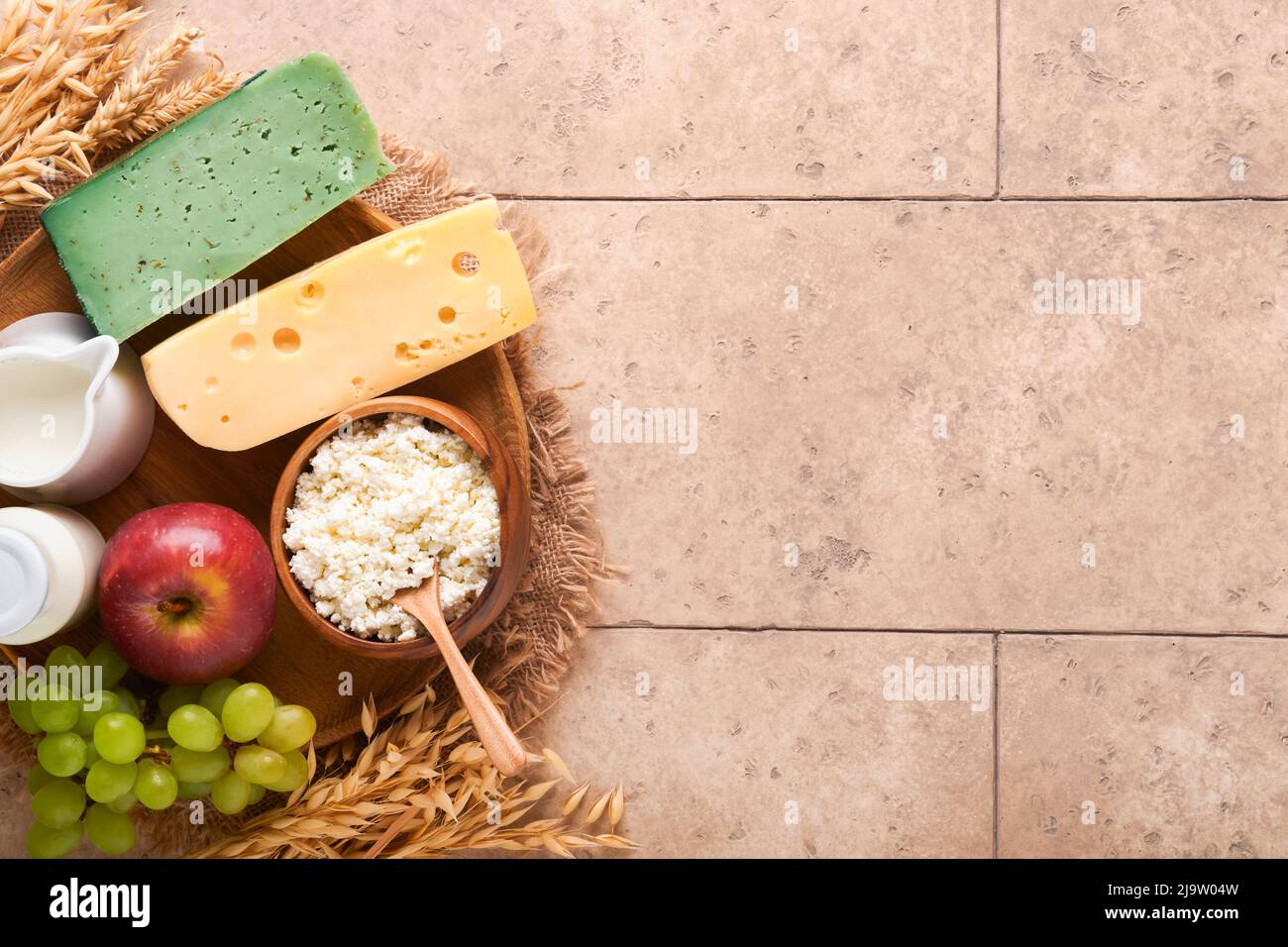 Happy Shavuot. Background for Shavuot celebration. Milk and cheese ...