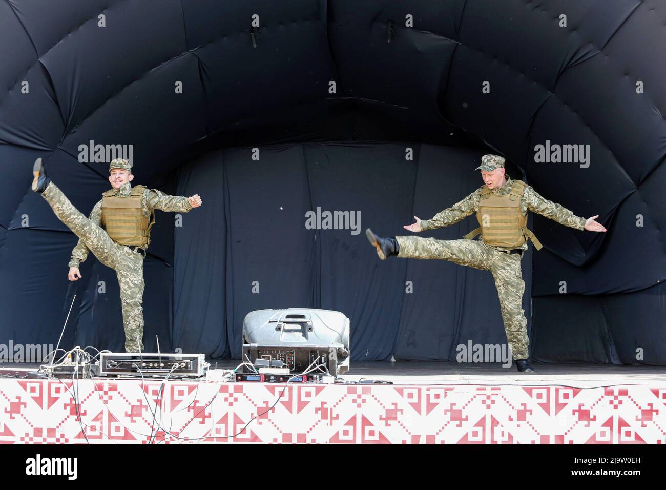 Men dressed in Ukrainian Armed Forces uniform perform in a dance during ...