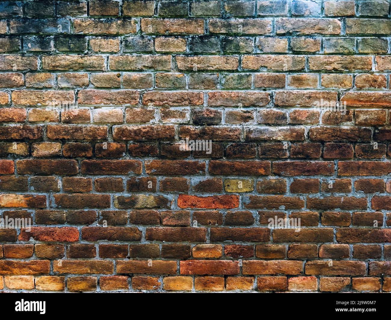Old ruin, weathered brick wall surface as urban background and texture ...