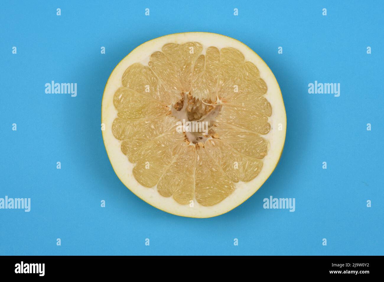 Perfectly retouched pomelo on blue background. High resolution photo ...