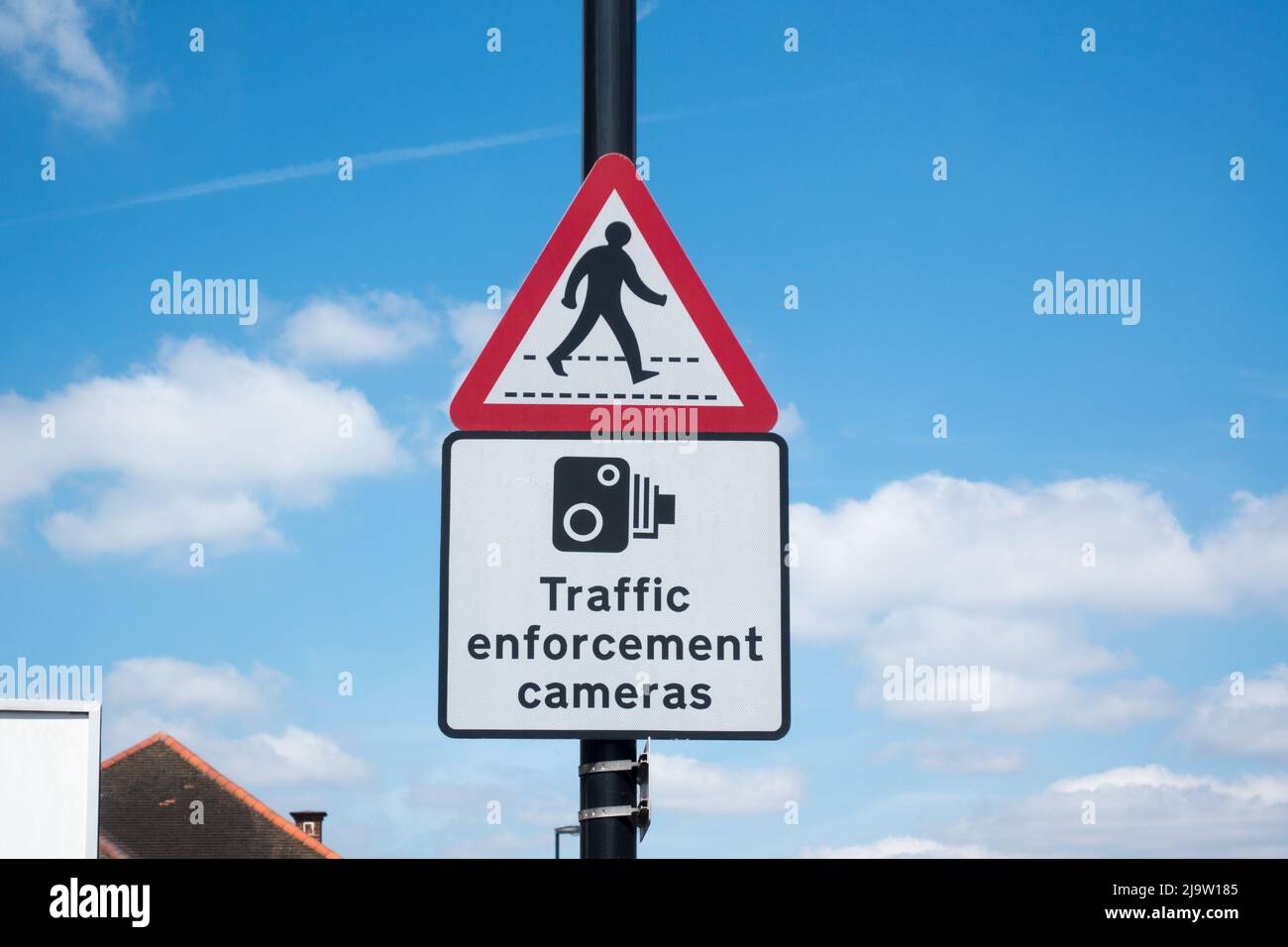Traffic enforcement cameras warning board on a lamppost in residential ...