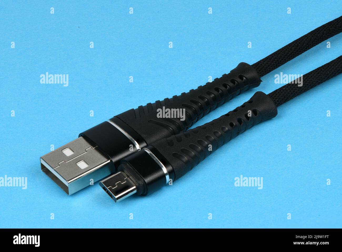 Closeup of an USB connector isolated on blue. High resolution photo ...