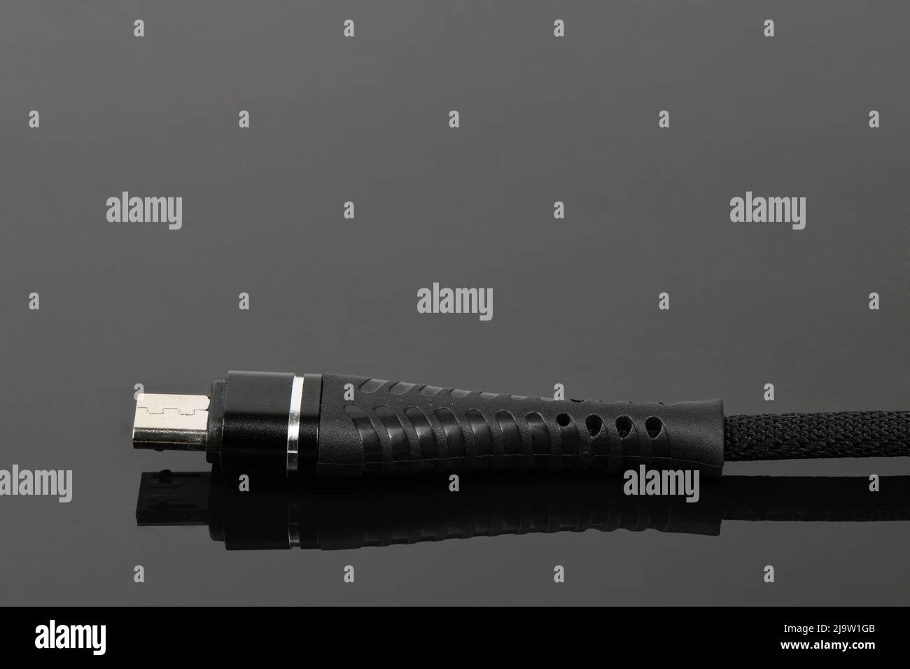 Closeup of an USB connector on black acrylic background. High ...