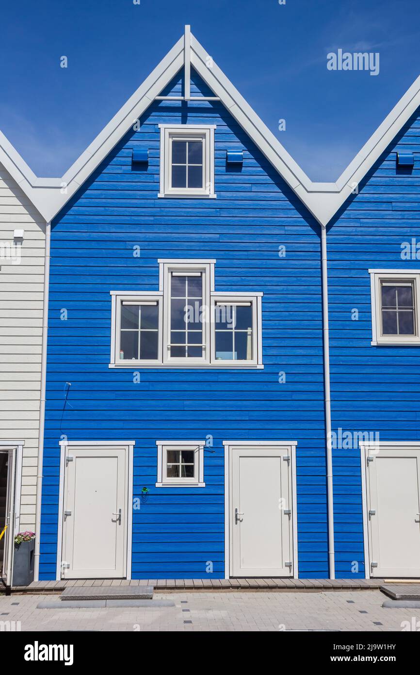 Bright blue wooden house in historic city Harderwijk, Netherlands Stock ...