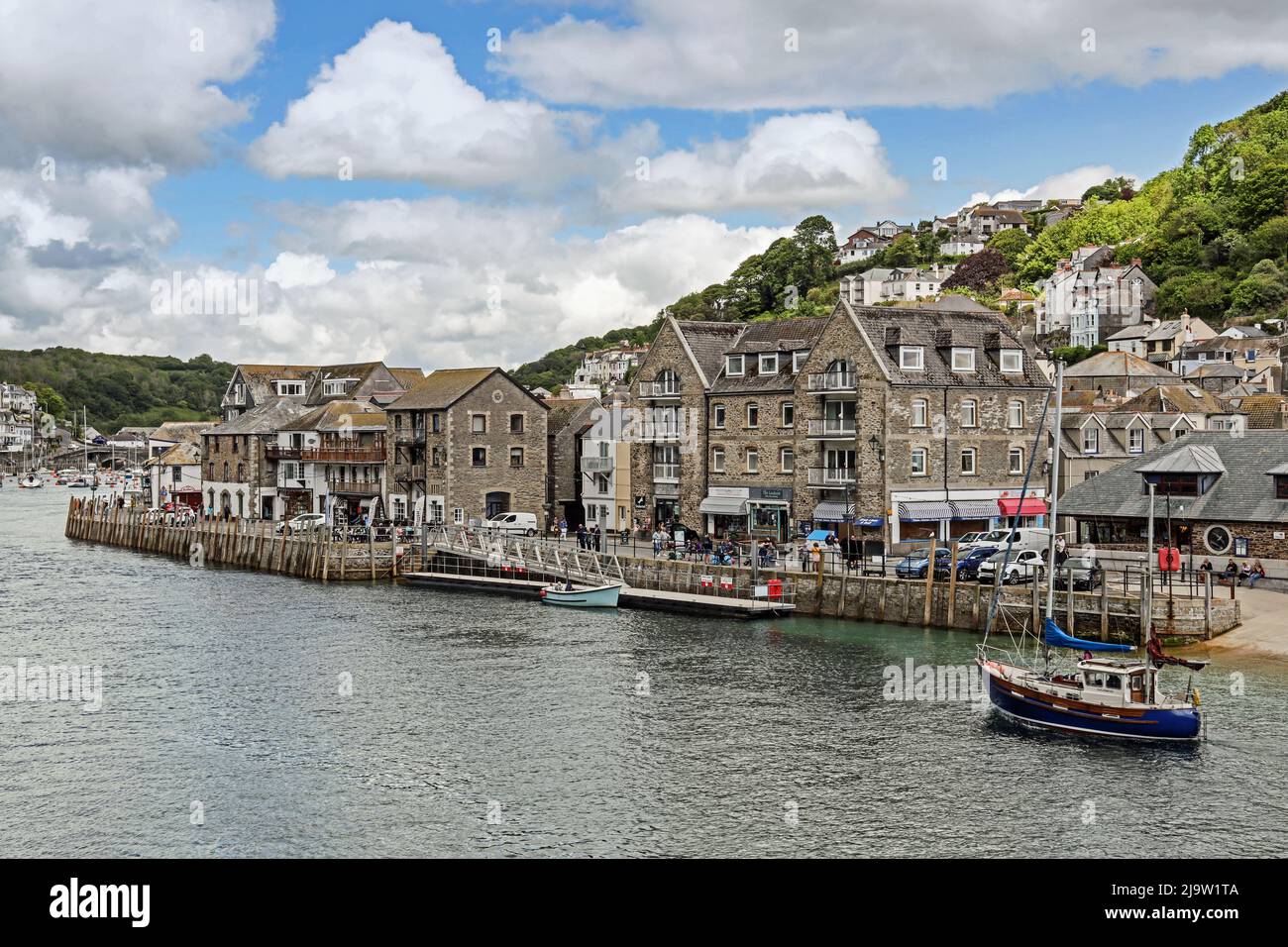 The RNLI and other shops along the banks of the River Looe in East Looe ...