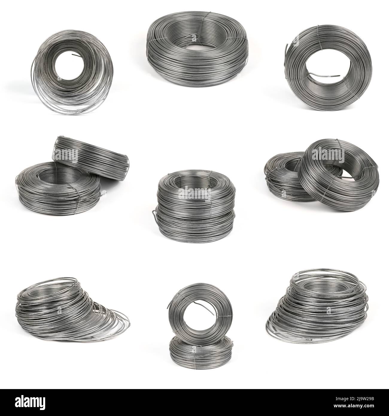 Nine coil of galvanized wires lying on white background. High ...
