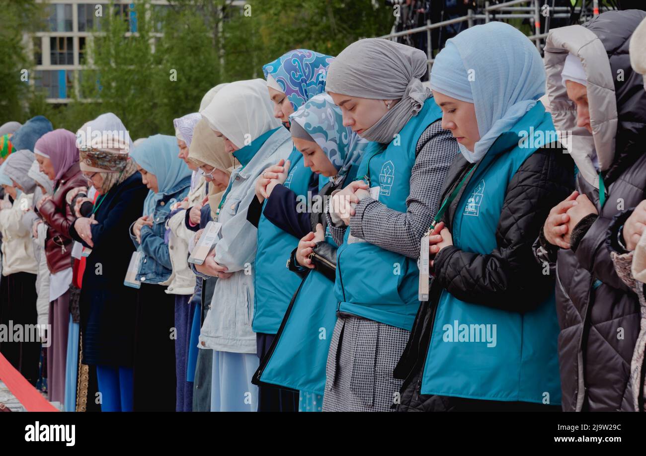Kazan, Russia. May 20. 2022. Muslim women pray. Namaz. Women stand ...