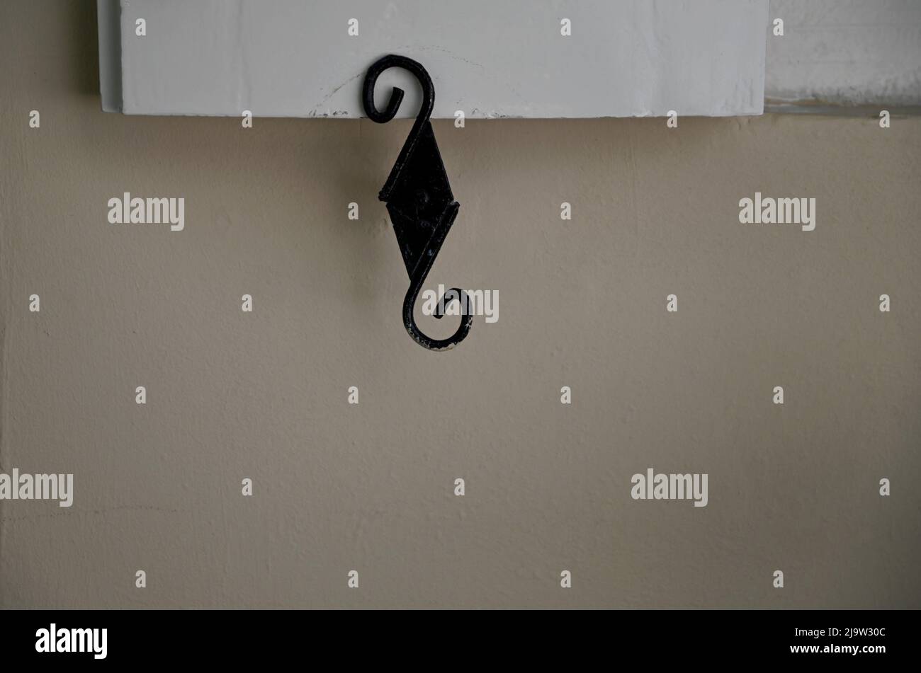 Old rural house white wooden window shutter with a retro metal shutter ...