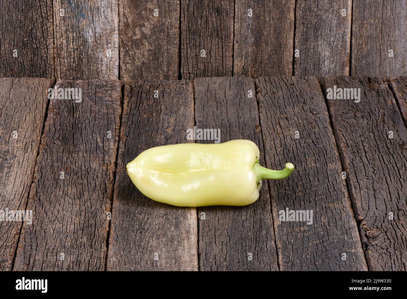 Bulgarian pepper isolated on dark wood background. High resolution ...