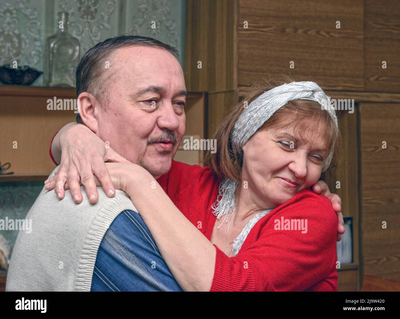 Closeup head and shoulders portrait of elderly pair that are friendly ...