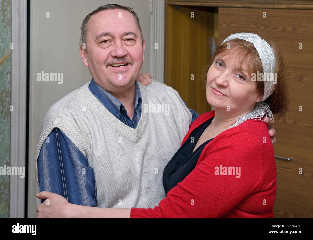 Closeup head and shoulders portrait of elderly pair that are friendly ...