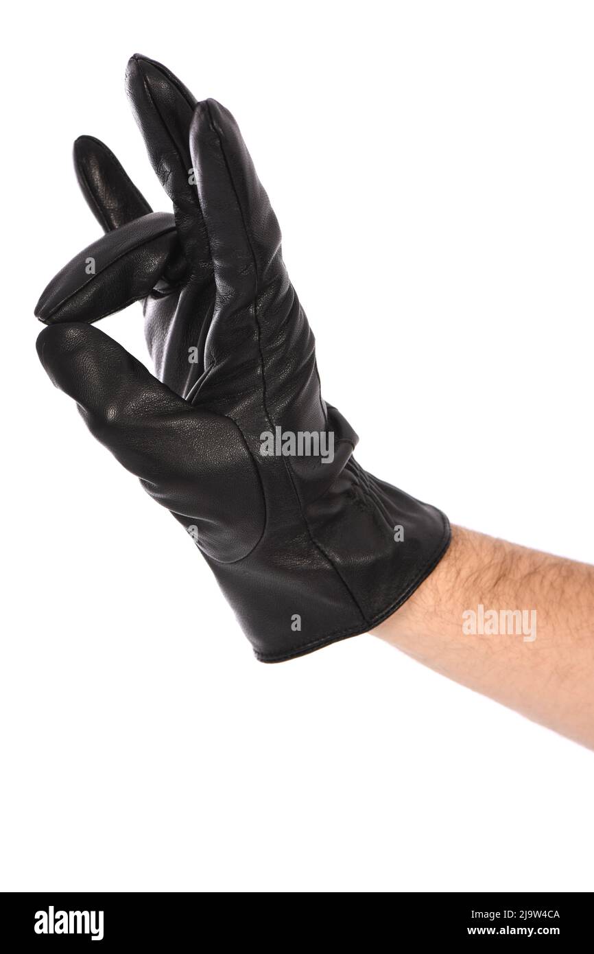 Man wearing black leather glove on white background, closeup. Side view ...