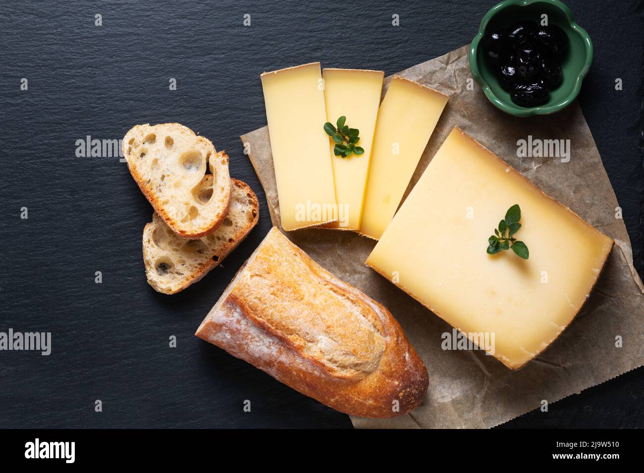 Food concept organic French Comté cheese with french bread baquette on ...