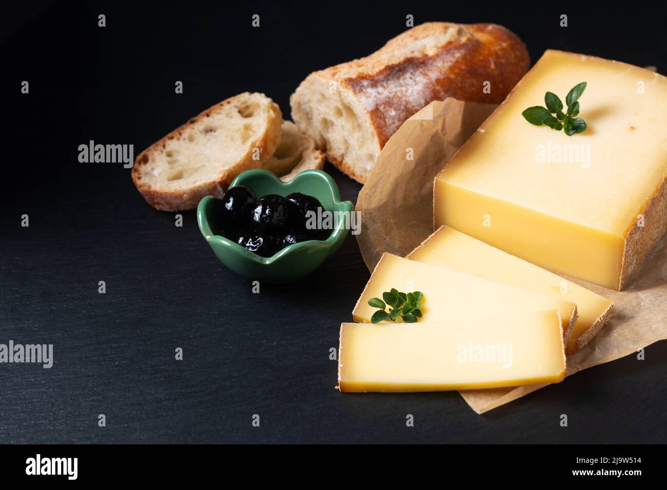 Food concept organic French Comté cheese with french bread baquette on ...