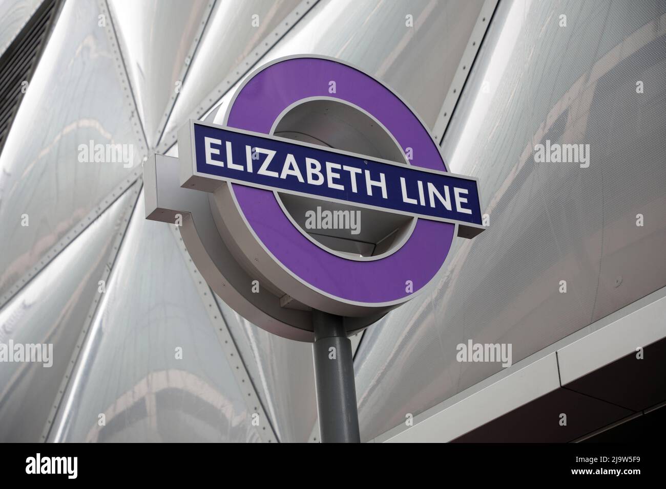London, UK. 25th May, 2022. A sign advertising the Elizabeth line named ...