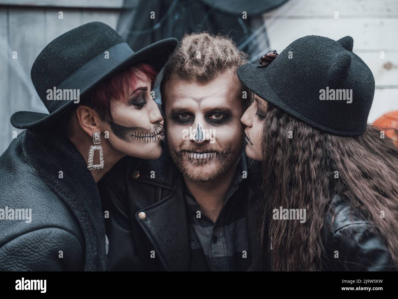 Scary family, mother, father, daughters celebrating halloween ...