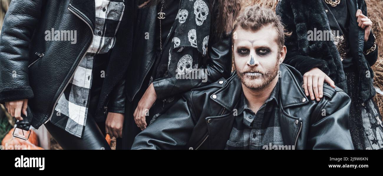 Scary family, mother, father, daughters celebrating halloween ...