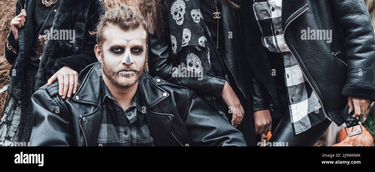 Scary family, mother, father, daughters celebrating halloween ...