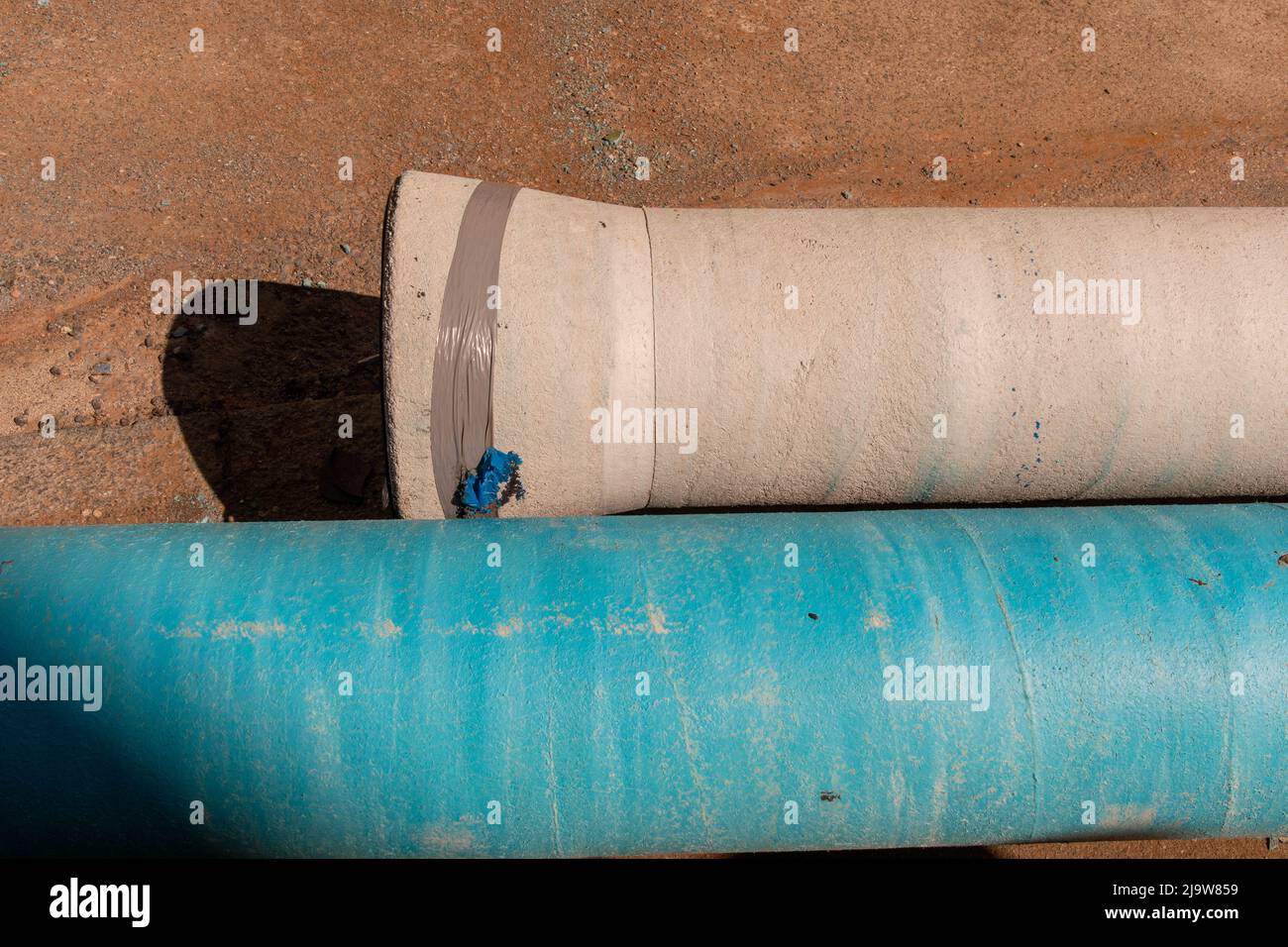 Two supply pipes for water and gas on one construction site Stock Photo ...