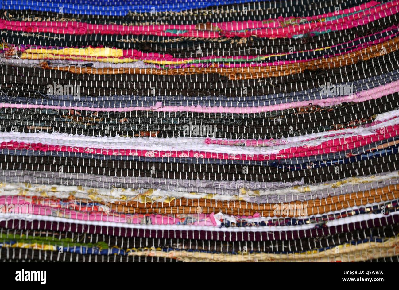 Traditional handwoven colorful kourelou rug Stock Photo - Alamy