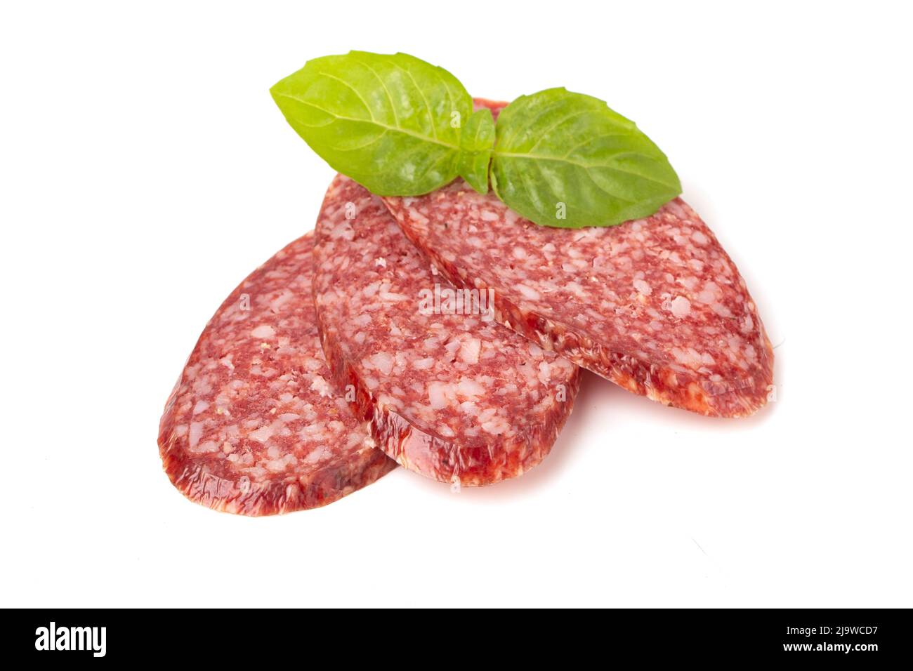 Beef Dried smoked Salami sausage sliced in close-up, isolated on a ...