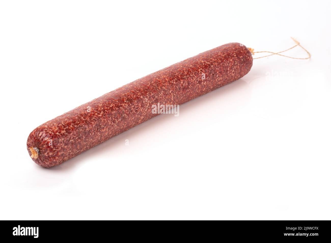 Beef Dried Smoked Salami sausage in close-up, isolated on a white background Stock Photo - Alamy