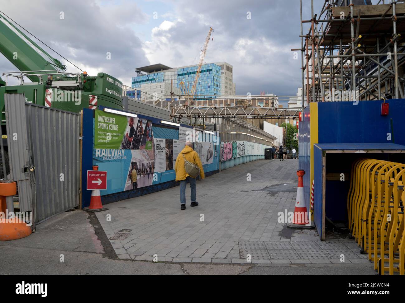 Workers finishing construction of the Elizabeth Line underground train ...