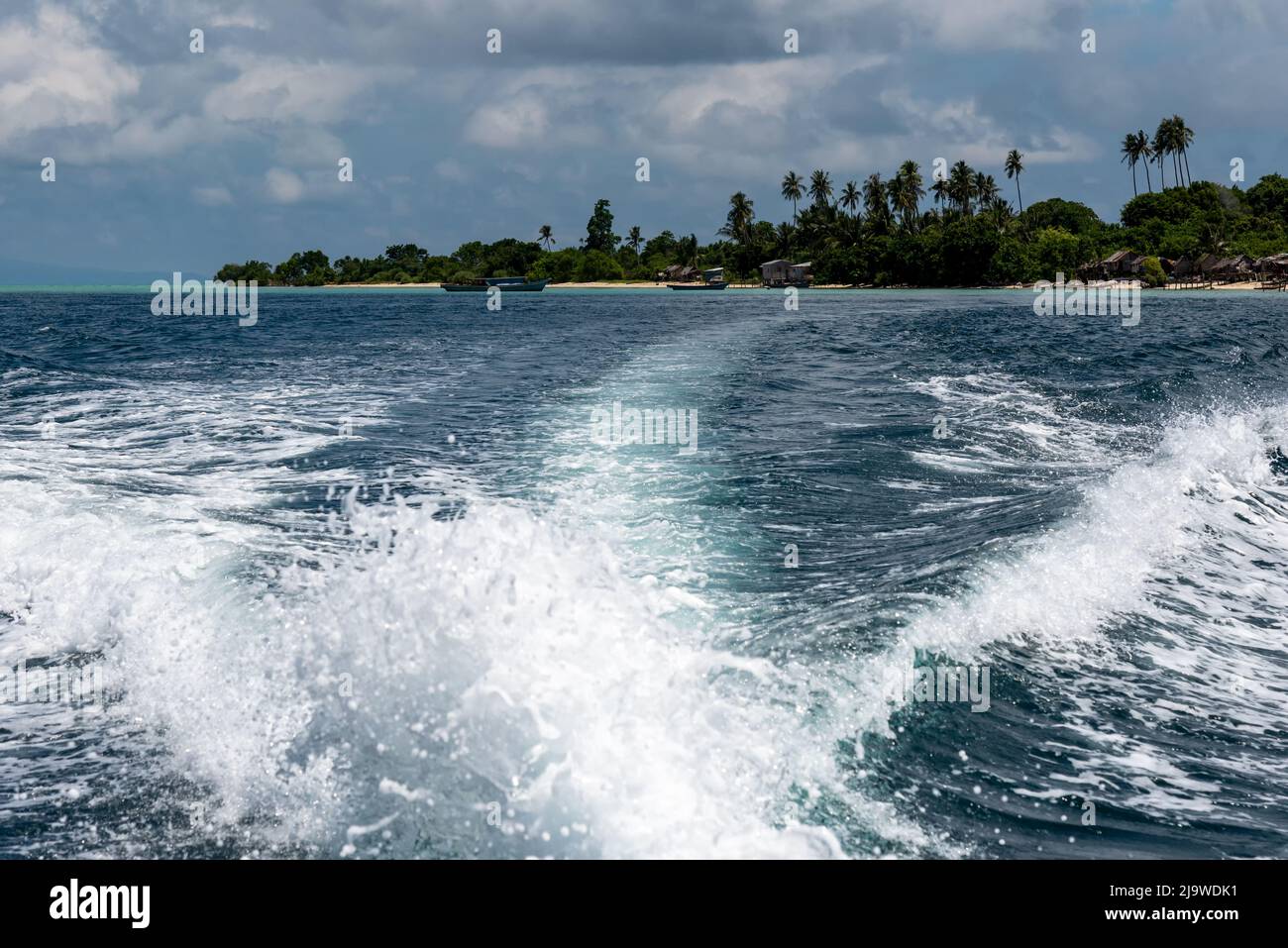 Boat wake leaving Maiga island in Semporna Sabah Borneo Malaysia Stock ...
