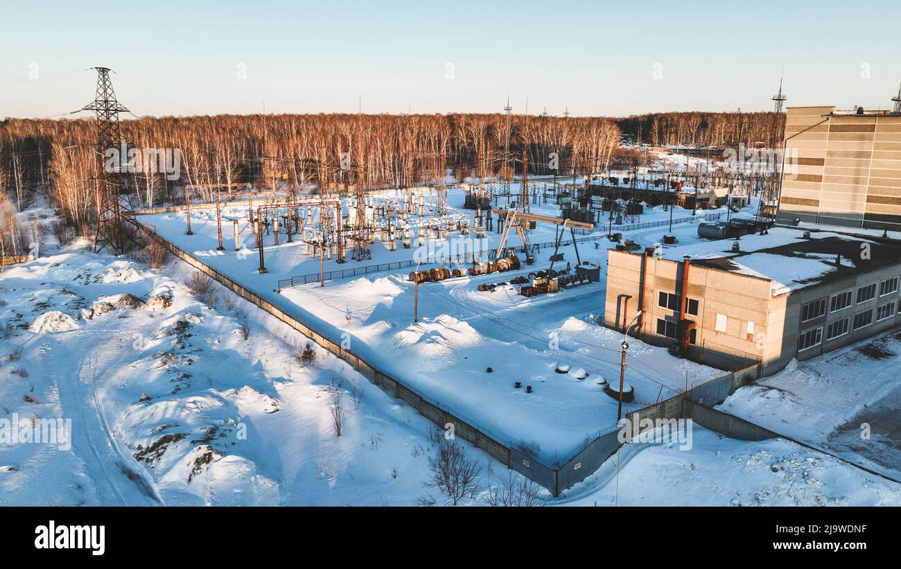 Electrical substation in snow winter. Aerial view Stock Photo - Alamy