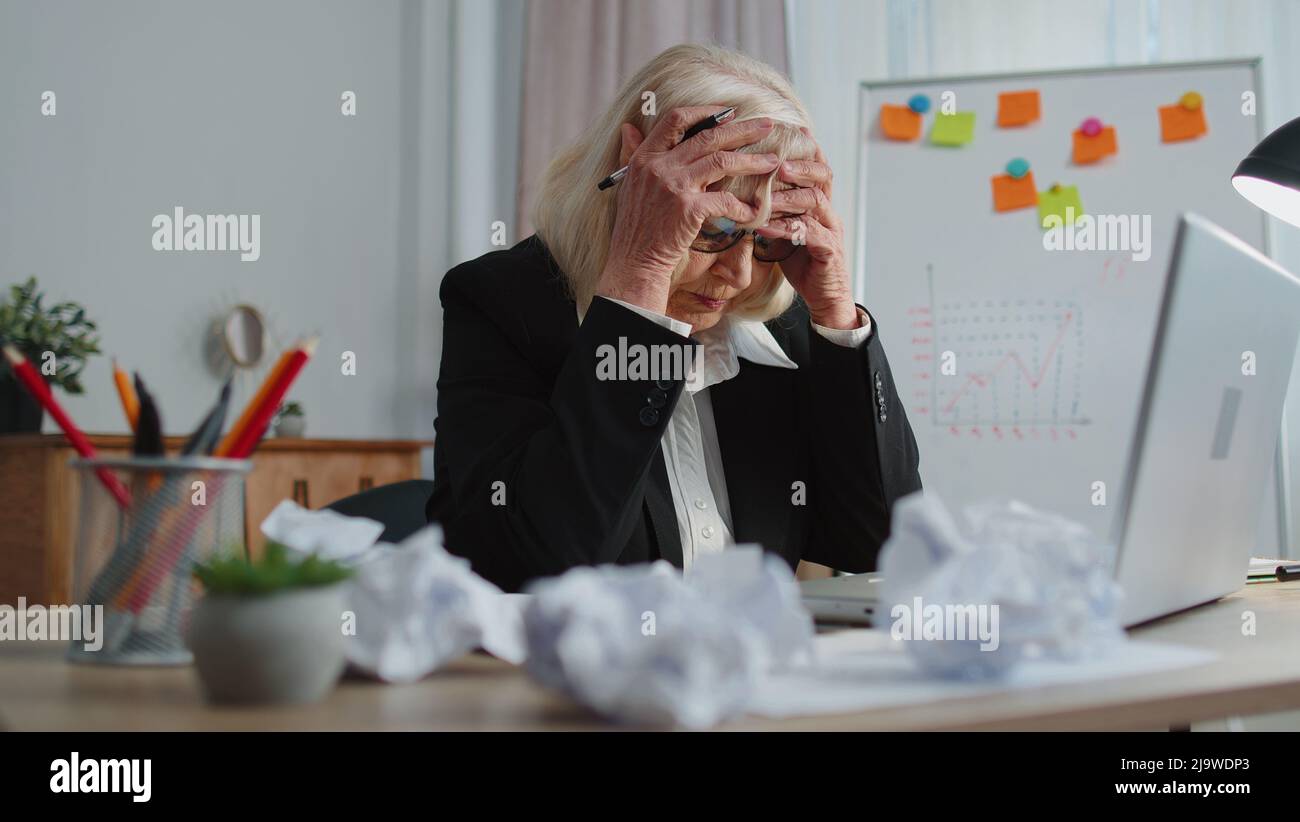 Senior lady having problems computer hi-res stock photography and ...