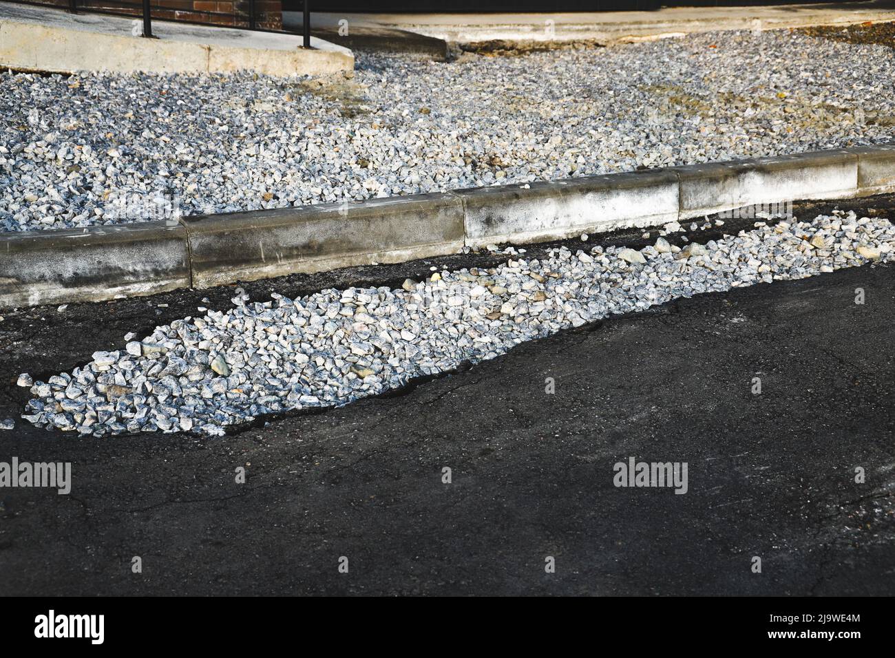 Pit filled with rubble on road close-up. Defect fix on asphalt Stock ...