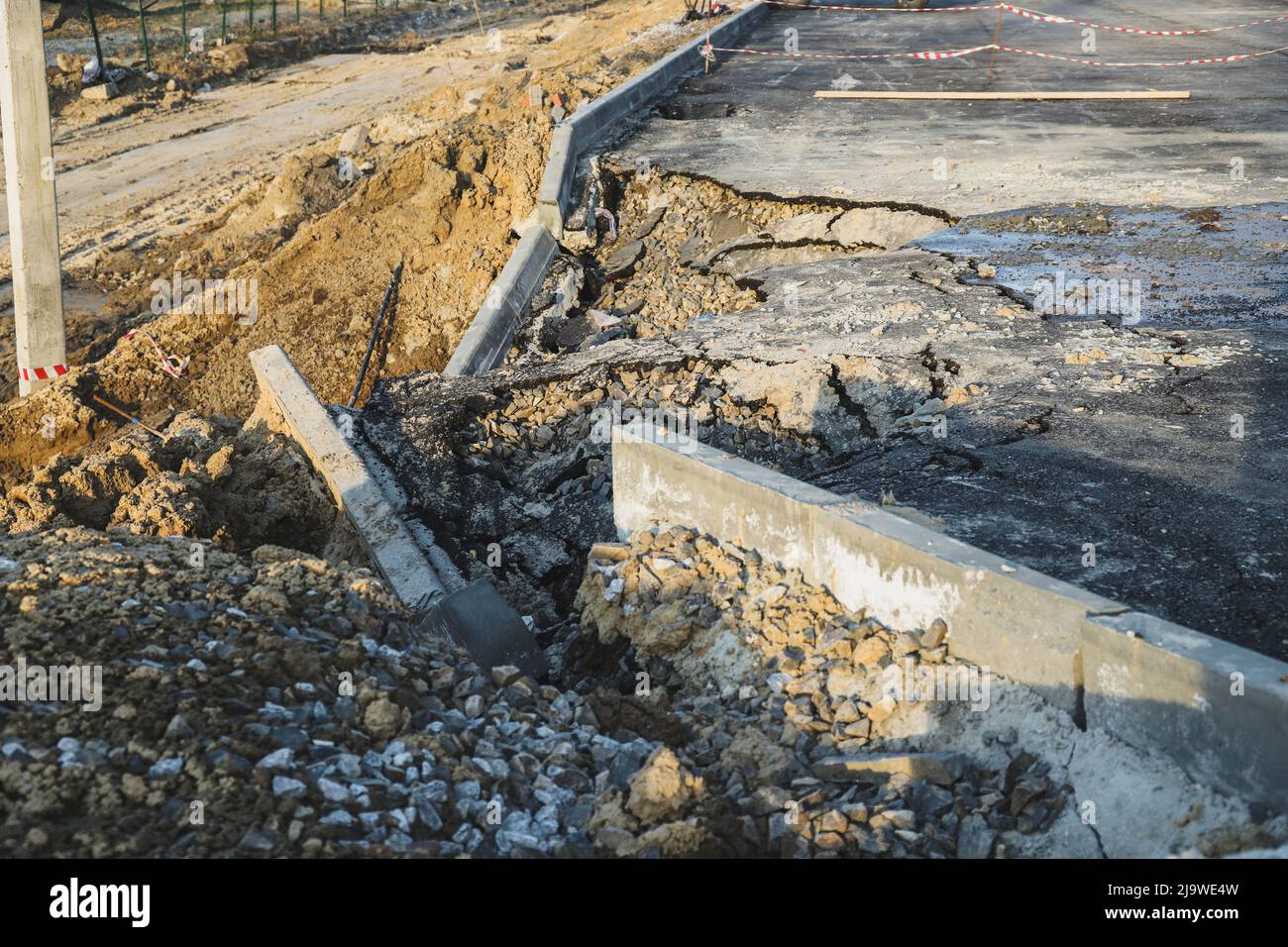 Asphalt swelling close-up. Pothole and pit on road Stock Photo - Alamy