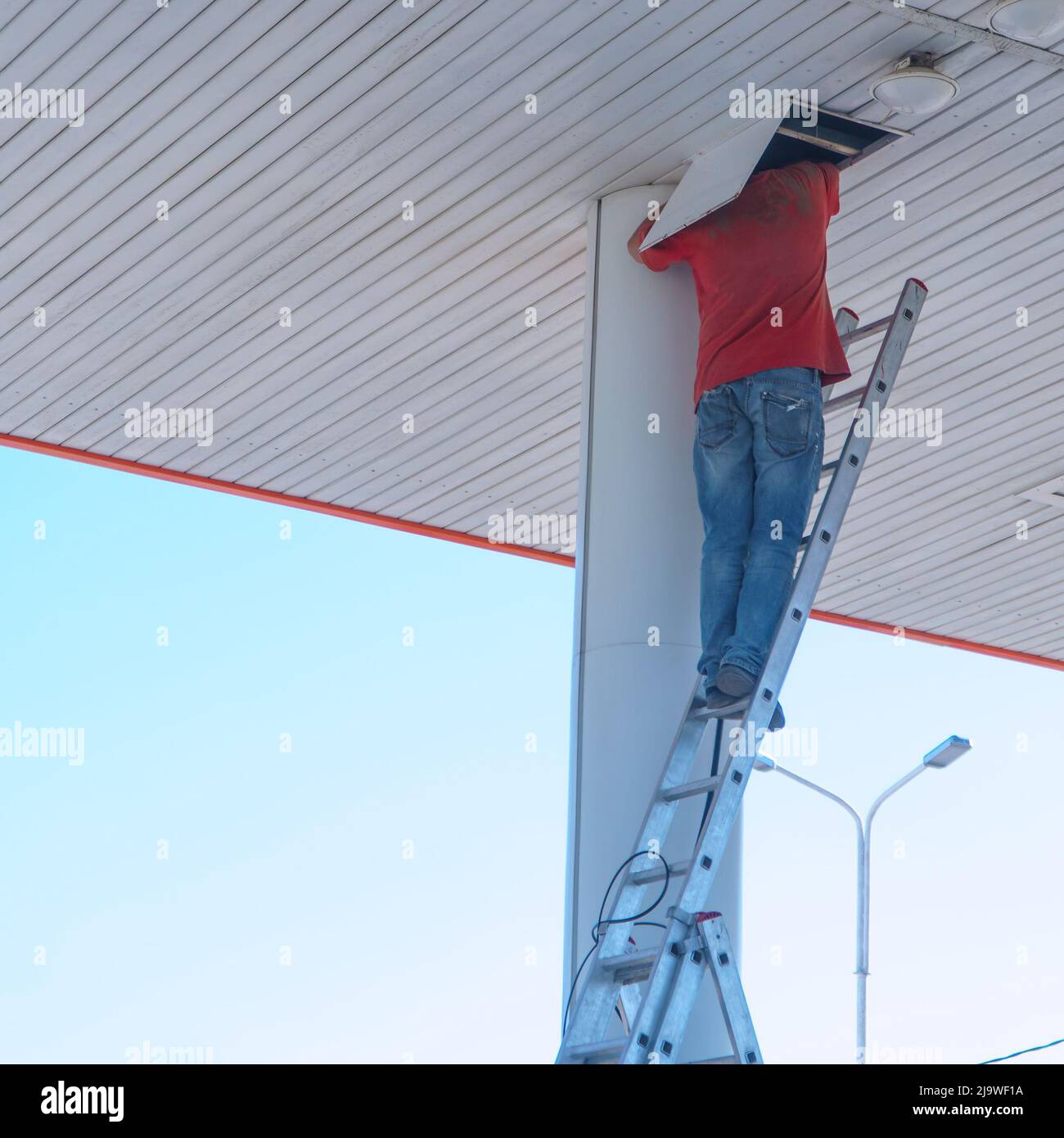 Installing a ceiling fixture hi-res stock photography and images - Alamy